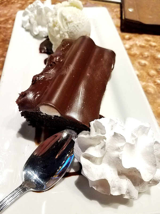 Michigan's beloved Sanders Bumpy Cake makes an appearance, chocolate perfection with buttercream "bumps" under a glossy fudge coating that locals instantly recognize.