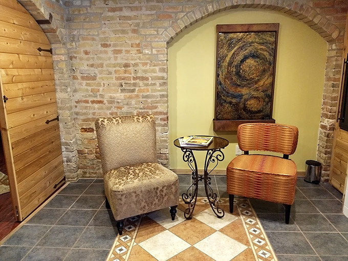 Seating Nook: A quiet corner where brick meets comfort, perfect for savoring a glass of wine while contemplating life's mysteries or tomorrow's breakfast options.