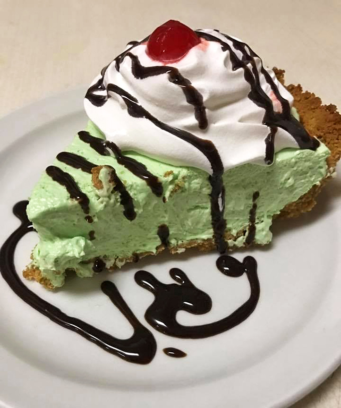 The Shamrock Shake pie &ndash; where mint green dreams meet whipped cream reality, topped with a cherry that's basically jewelry.