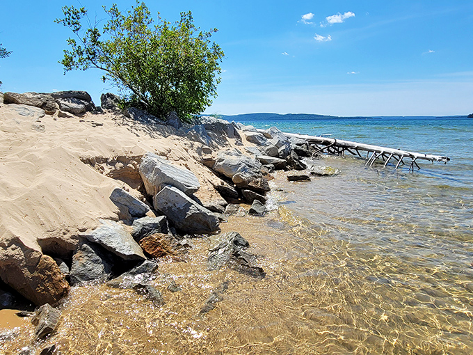 Rocky outcrops along the shore create natural sculptures that prove Mother Nature has better design sense than most landscape architects.