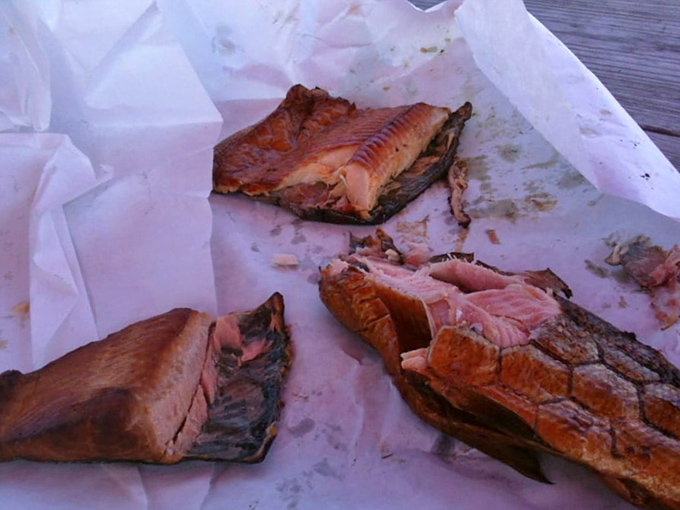 Flaky, succulent, and ready to devour &ndash; these smoked fish portions reveal their perfect pink interiors, begging to be sampled.