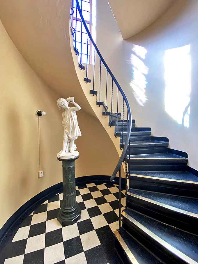 These spiral stairs have seen more glamorous footsteps than a Hollywood red carpet, each one echoing with stories of circus royalty and their fabulous friends.