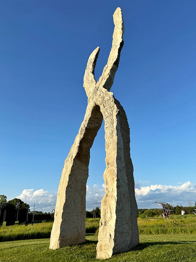 Standing sentinel like a modern Stonehenge, this monolith connects our ancient past to contemporary artistic expression.