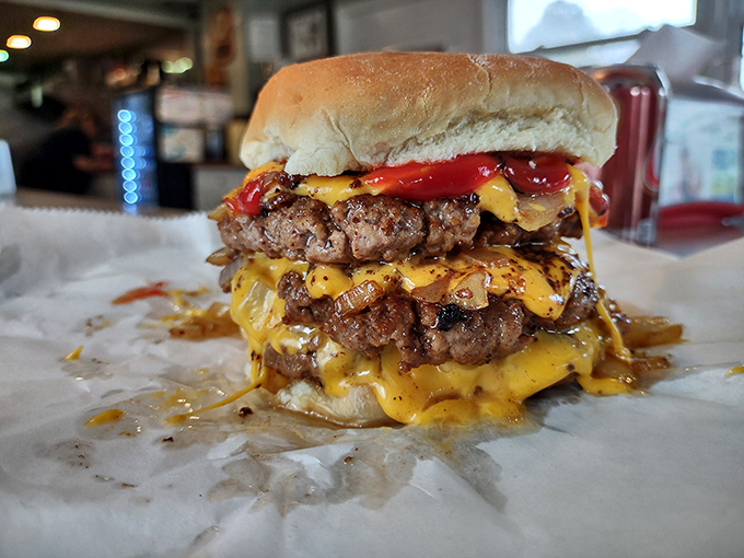 Behold the Triple Cheeseburger &ndash; a towering monument to excess that somehow remains perfectly engineered for human consumption, no fork required!