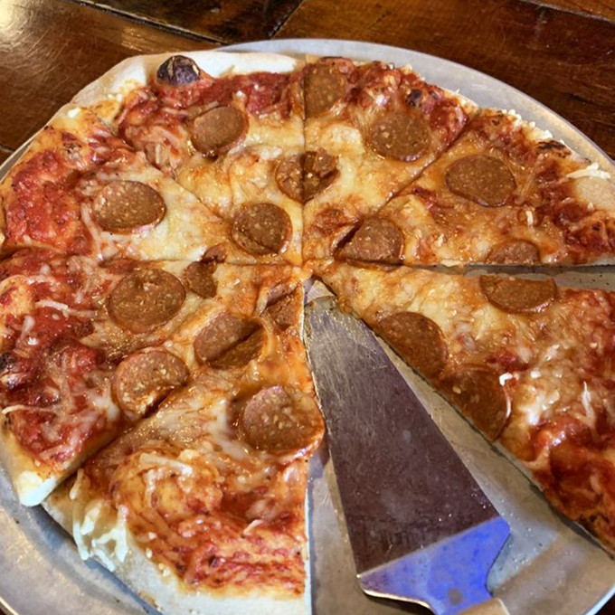 Vegan pepperoni that actually crisps at the edges? It's not witchcraft, it's The Mitten's commitment to plant-based perfection on a perfect crust.