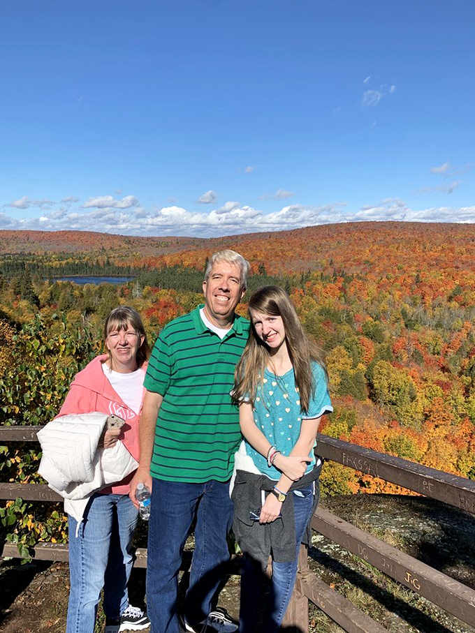 Visitors: Happy hikers capture the moment at the overlook – proof that some views are worth every drop of sweat.