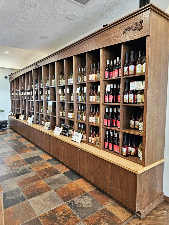 Wine shopping paradise &ndash; shelves lined with bottles representing years of passion, expertise, and Michigan's unique terroir.