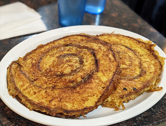 Each spiral delivers a perfect balance of cinnamon warmth and custardy softness, with crispy edges for textural contrast.