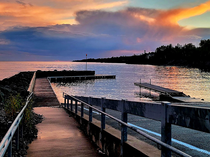 Sunset serenade: The wooden pier extends into Lake Superior, offering front-row seats to nature's most spectacular light show.