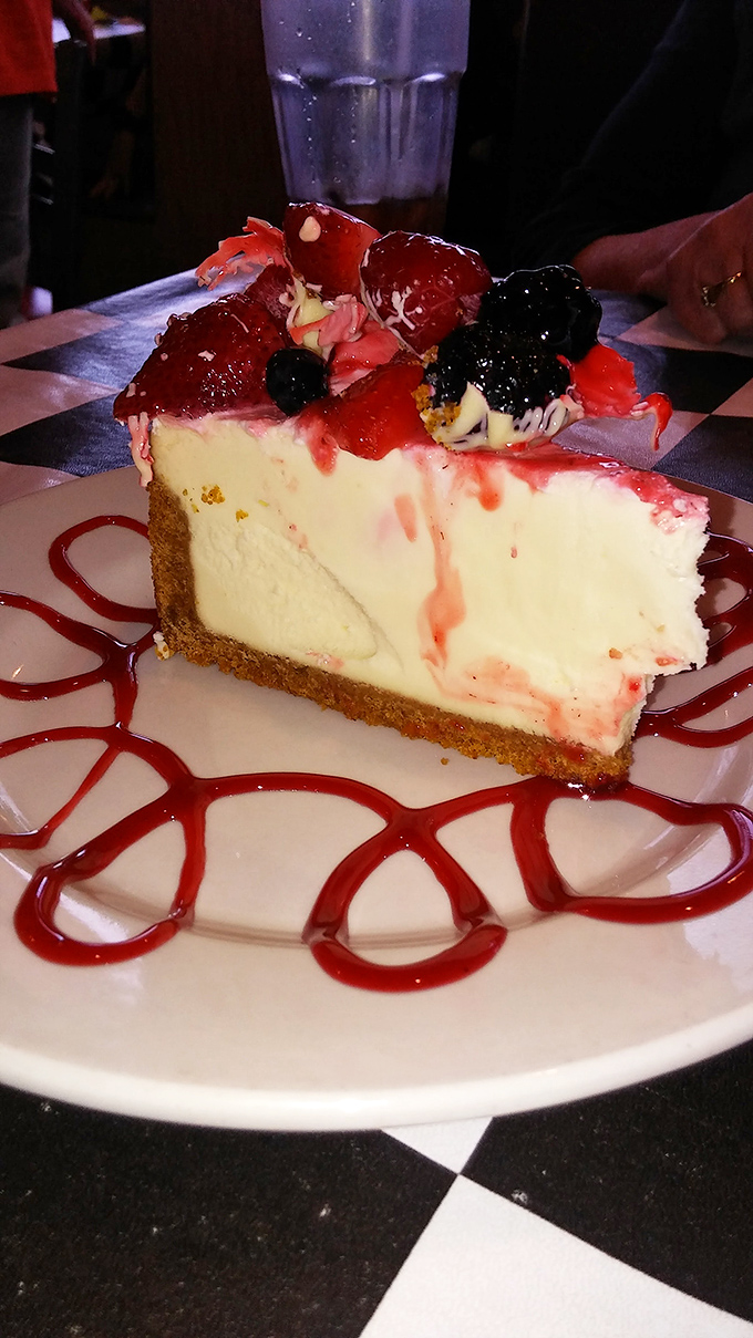 Cheesecake topped with fresh berries that makes you question why you ever waste stomach space on vegetables.