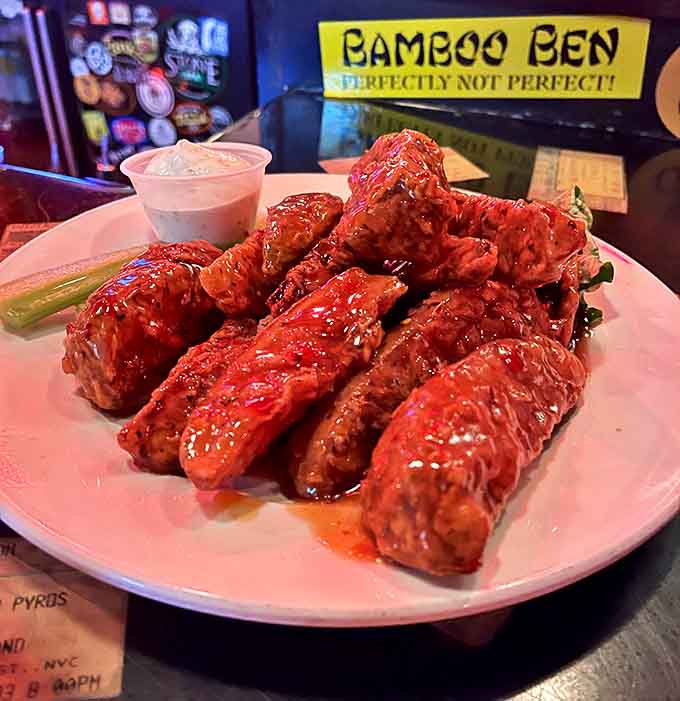 Bamboo Ben's wings glisten with sauce so good you'll be tempted to lick your fingers, your plate, and possibly your neighbor's plate too.