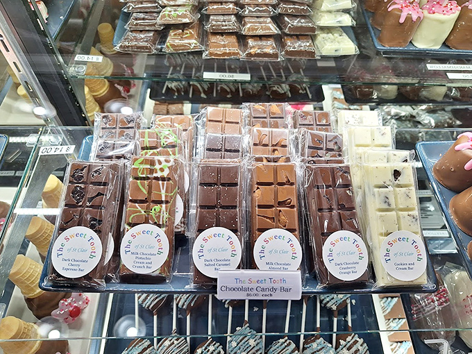 Chocolate bars lined up like sweet soldiers, each variety promising a different journey for your taste buds.