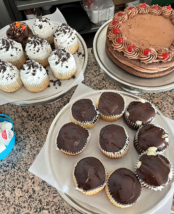 The dessert display case&mdash;where willpower goes to die and happiness begins its sugary reign.