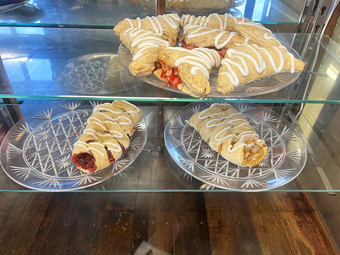 Fruit turnovers that shatter into buttery shards, revealing fillings that taste like summer decided to throw a party in pastry form.