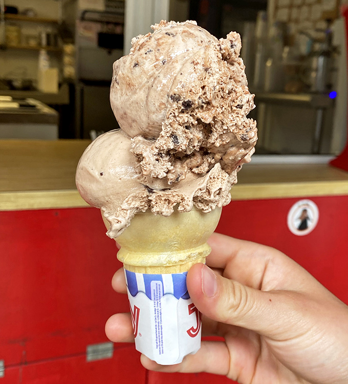 A scoop of homemade ice cream perched atop a crisp cone &ndash; the simplest pleasure becomes extraordinary when crafted with this level of care.