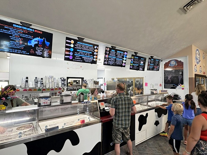 The ice cream counter at MOO-ville &ndash; where dreams come true and diets go to die in the most delicious way possible.