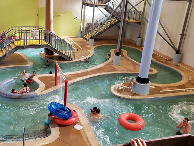 The main pool area serves as the heart of the water park, where families converge for aquatic bonding time.