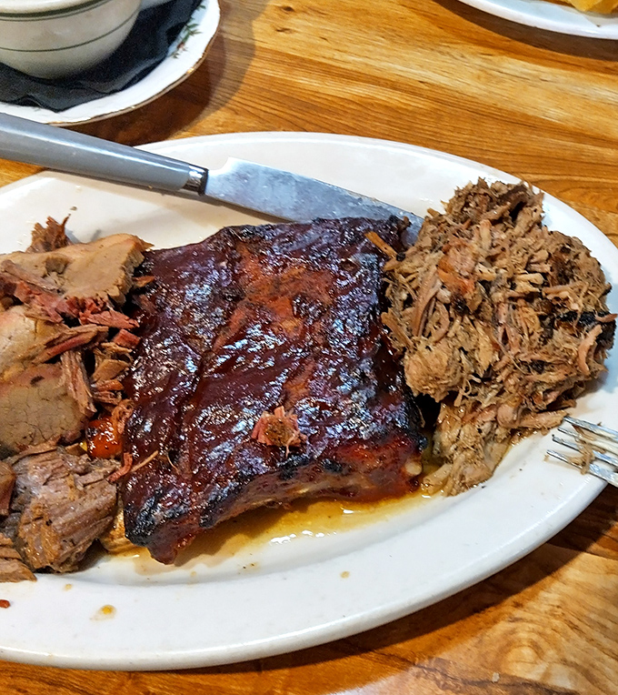 The ultimate BBQ power couple: tender ribs alongside pulled pork so succulent it makes you want to propose marriage to the smoker.