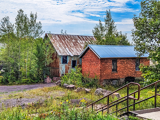 Rustic buildings dot the Champion Mine complex, their weathered wood and corrugated metal creating a photographer's paradise of textures and shadows.