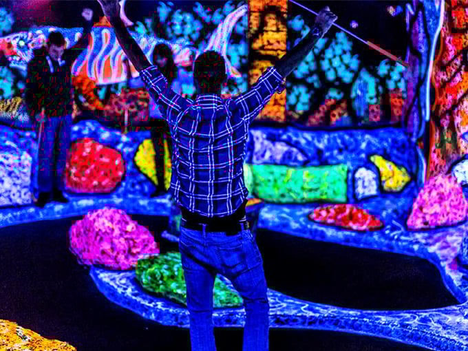 Victory never looked so vibrant! Even adults can't help striking triumphant poses when conquering these glowing challenges.