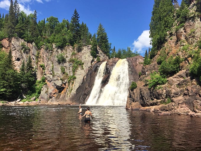 High Falls plunges dramatically between ancient rock walls, creating a wilderness cathedral where the only sermon needed is the thundering water itself.
