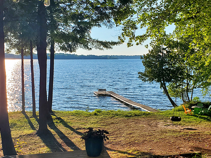 A simple wooden dock stretches toward possibility, inviting contemplation and maybe an impromptu cannonball. Perfection in simplicity!