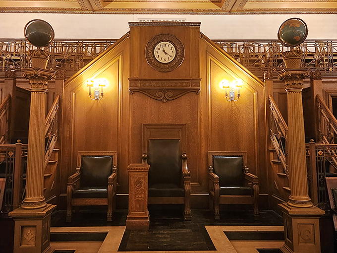 The Master's chair stands ready for ceremonial proceedings, its wooden craftsmanship speaking to traditions centuries in the making.