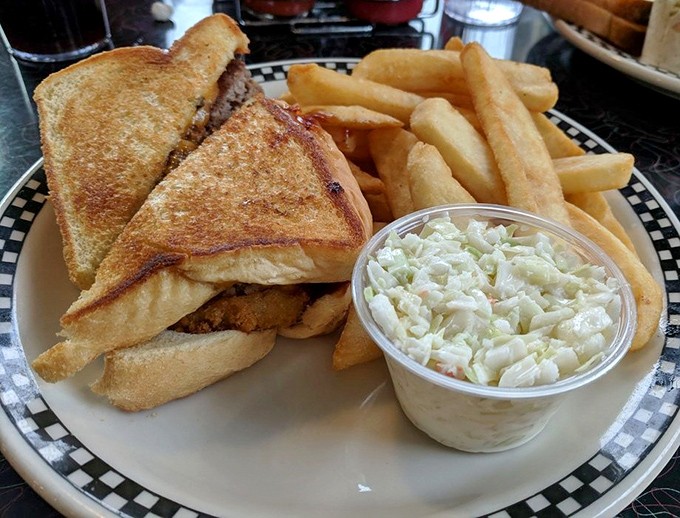 The sandwich basket comes with a generous portion of golden fries and creamy coleslaw – the holy trinity of diner perfection.