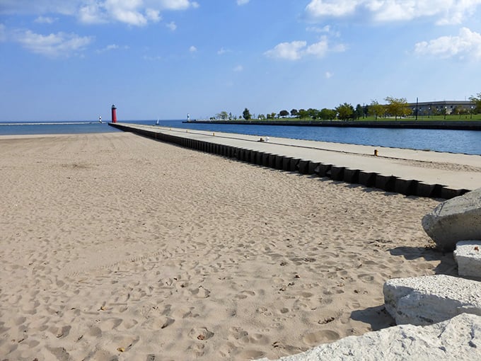 The iconic Kenosha North Pier Lighthouse stands sentinel at the harbor entrance, creating postcard-worthy photo opportunities for visitors.