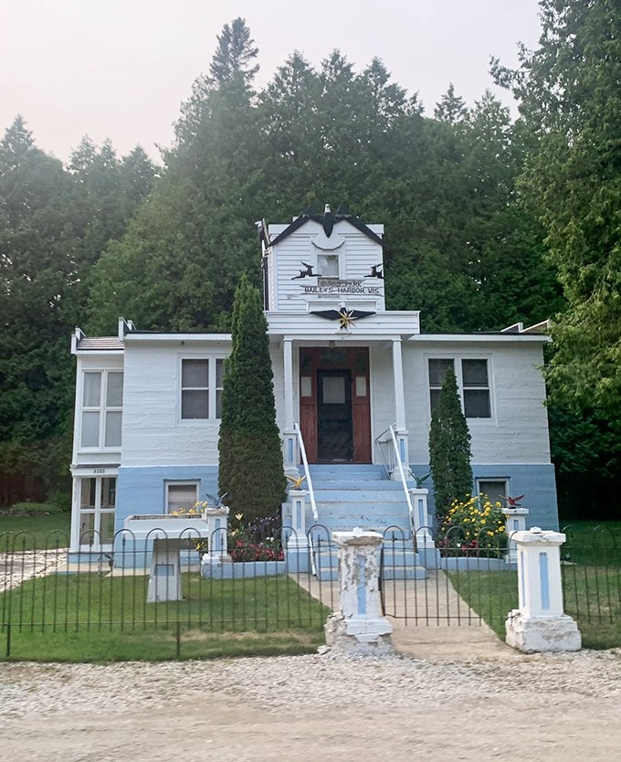 The Bird Park House showcases whimsical blue and white architecture &ndash; a Victorian-era treasure nestled among Door County's natural beauty.