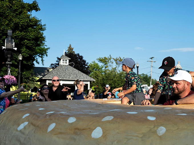 This mammoth burger creation requires multiple handlers and possibly its own zip code, rolling majestically through downtown like edible royalty.