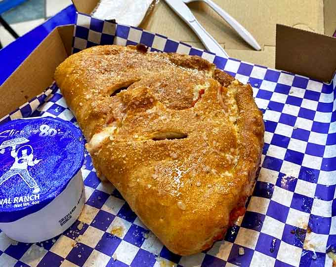 This calzone is the Springsteen of Italian hand pies &ndash; robust, satisfying, and stuffed with more filling than your mom's shoulder pads.
