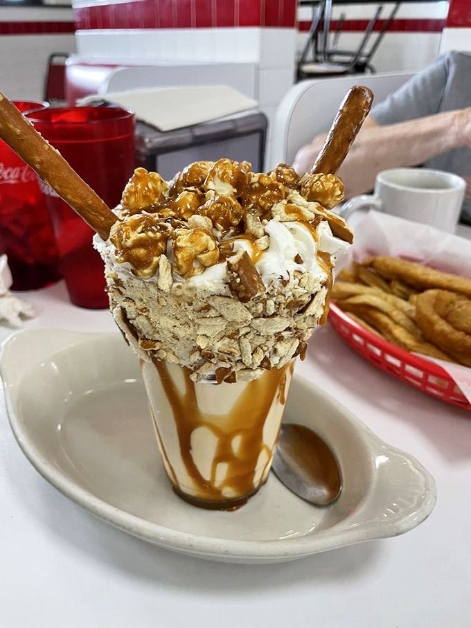 The caramel popcorn pretzel shake defies both gravity and restraint, proving that sometimes more really is more.
