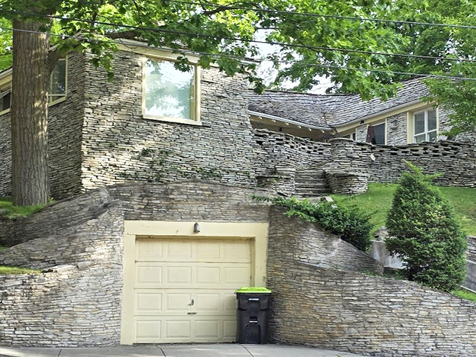 Even the garage gets the magical treatment, with terraced stonework transforming a utilitarian structure into another chapter of the fairy tale.