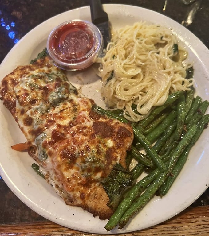 The Chicken Roma pairs a beautifully seared chicken breast with pasta and vibrant green beans &ndash; a plate that eats as good as it looks.