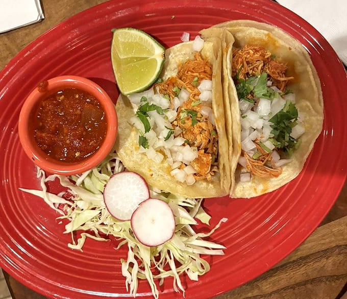 Street-style tacos done right&mdash;simple corn tortillas cradling perfectly seasoned chicken, topped with nothing more than they need: cilantro, onion, and lime.