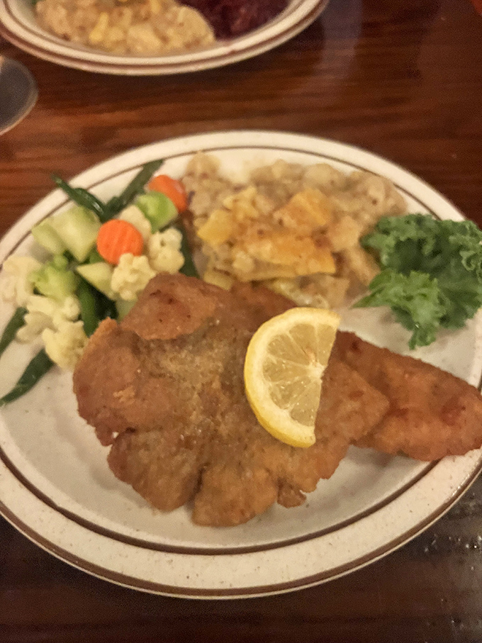 Wiener schnitzel so perfectly golden and crisp, it practically plays oom-pah music when your fork breaks through the crust.