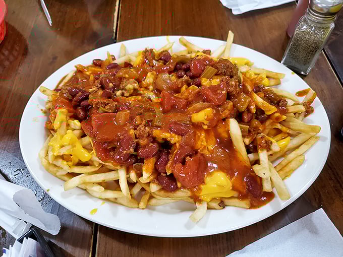 Chili cheese fries that require both strategy and stamina &ndash; a glorious avalanche of homemade chili and melted cheese atop crispy potatoes.