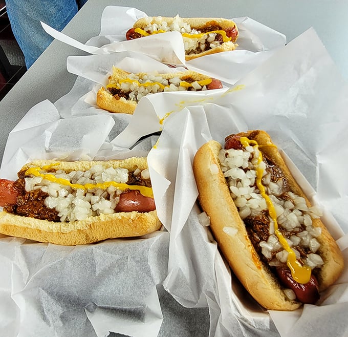 A quadro of perfectly dressed Coney Dogs awaits their fate &ndash; about to create four very happy customers and possibly some mustard-stained shirts.