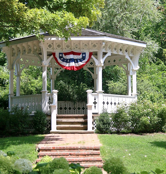 The village gazebo stands ready for impromptu proposals and community band concerts, proving some romantic notions have survived centuries of technological "progress."
