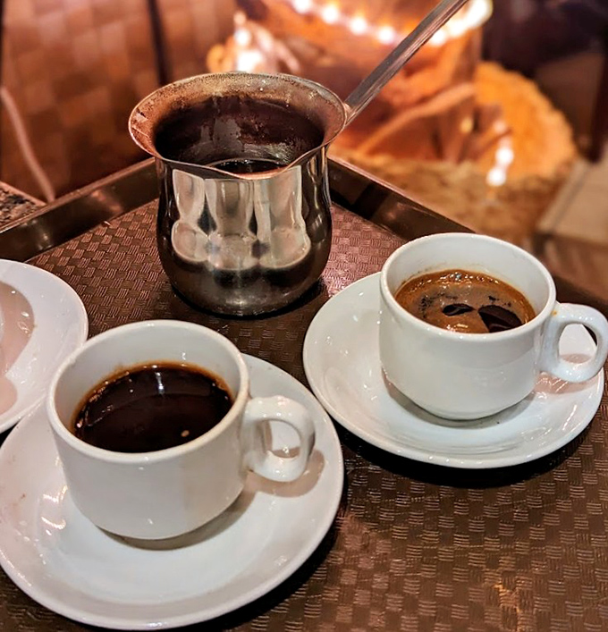 Turkish coffee served in traditional style &ndash; strong enough to wake the dead but smooth enough to complement the bakery's honey-sweet offerings.