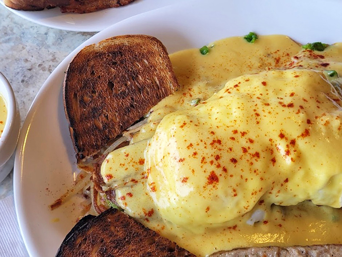 Eggs Benedict with hollandaise that actually looks like someone knows what they're doing in that kitchen.