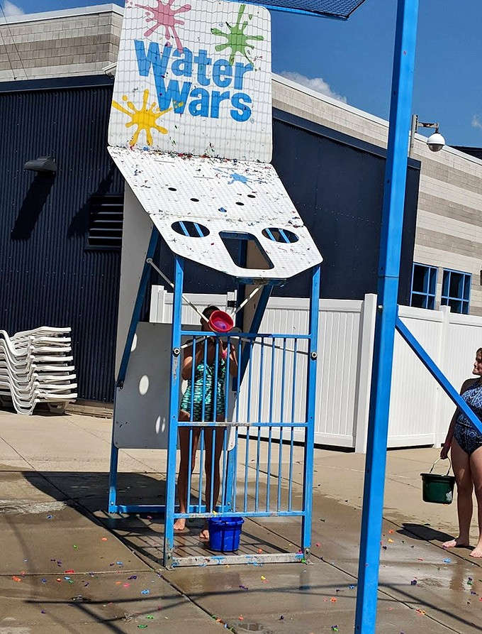 Water Wars lets kids test their aim and reflexes in this interactive splash battle that's basically summer camp meets arcade game.