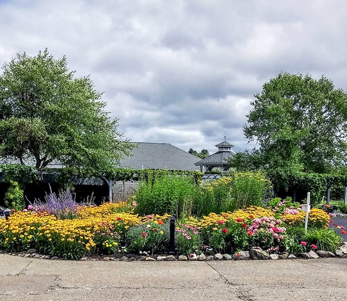 Vibrant blooms create a kaleidoscope of color in the meticulously maintained gardens, where even the bees seem to buzz with aristocratic purpose.