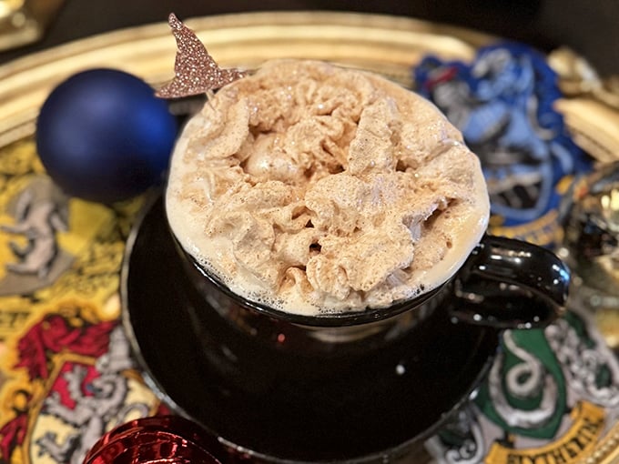 The Harry Potter-inspired potion disguised as coffee comes complete with magical toppings and a tiny broomstick garnish.