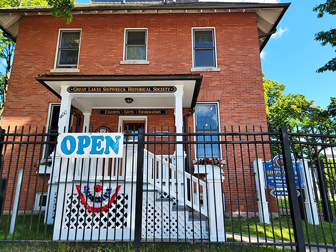 The Great Lakes Shipwreck Historical Society's brick building houses stories of maritime courage and tragedy that shaped the region's character.