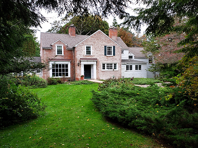 This stately brick residence showcases the elegant architectural details that made Manistee's historic homes both beautiful and timeless.