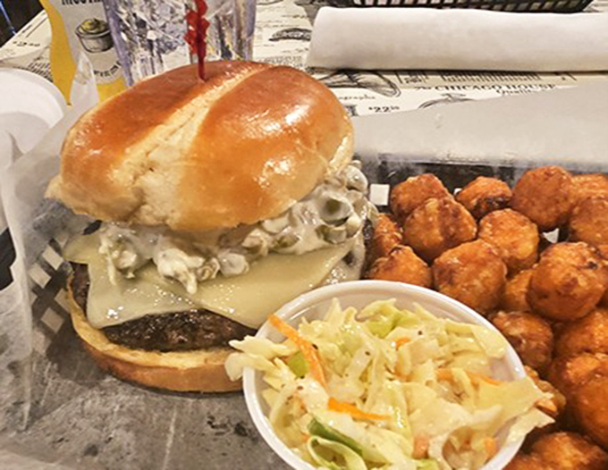 The Lumberjack's Burger demands both hands and several napkins &ndash; a towering creation of beef, bacon, cheddar, and crispy haystack onions.