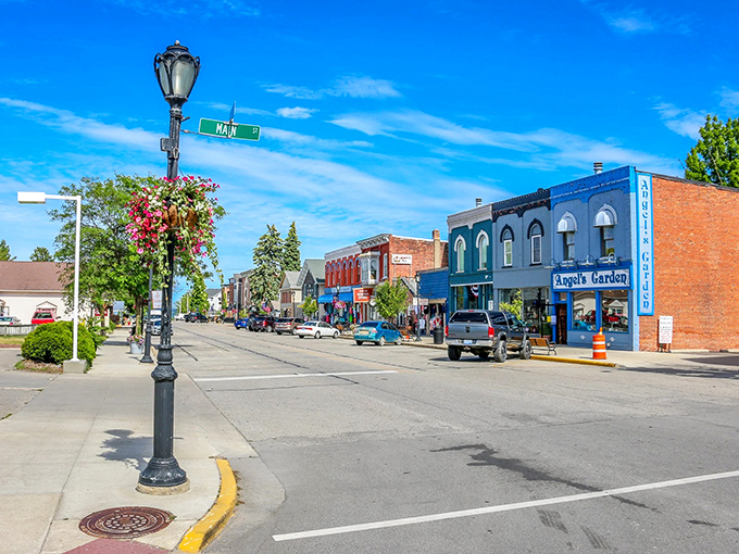 Main Street: Morning light bathes the historic storefronts in a golden glow, as shopkeepers prepare for another day in Michigan's most charming village.