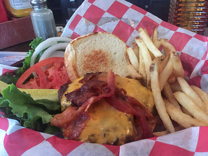 The bacon cheeseburger arrives like a beautiful dare&mdash;can you actually fit this masterpiece of excess into your mouth?